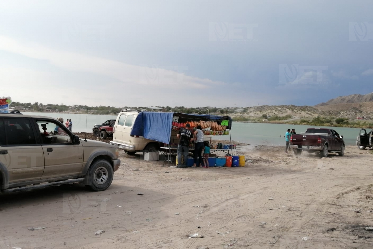 Acuden familias a la presa de Anapra